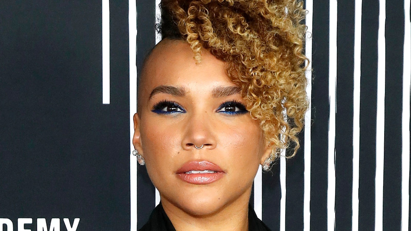 The Transformation Of Emmy Raver-Lampman From Childhood To The Umbrella ...